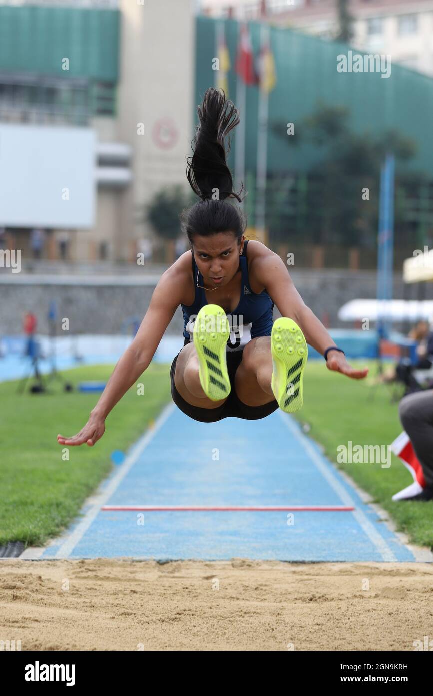 ISTANBUL, TURKEY - JUNE 23, 2021: Undefined athlete long jumping during ...
