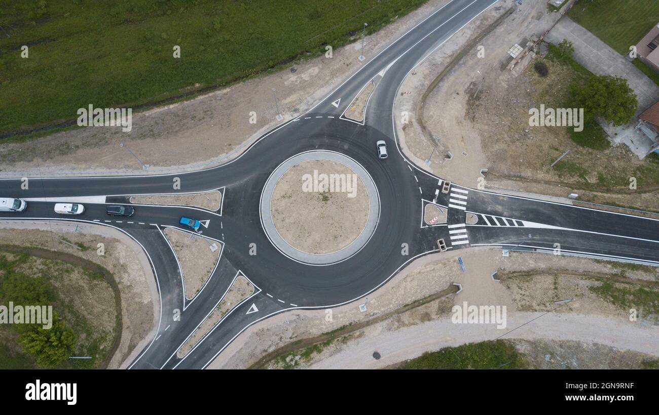 Aerial shot of a ring road surrounded by a field in the daylight Stock ...