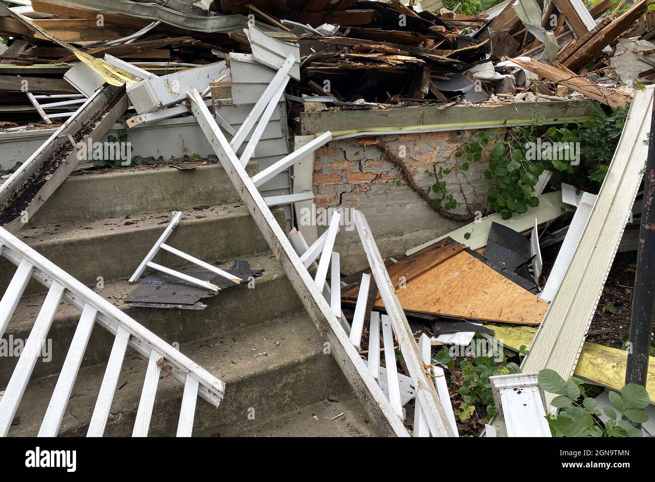 Debris piled up after the demolition of a house Stock Photo - Alamy