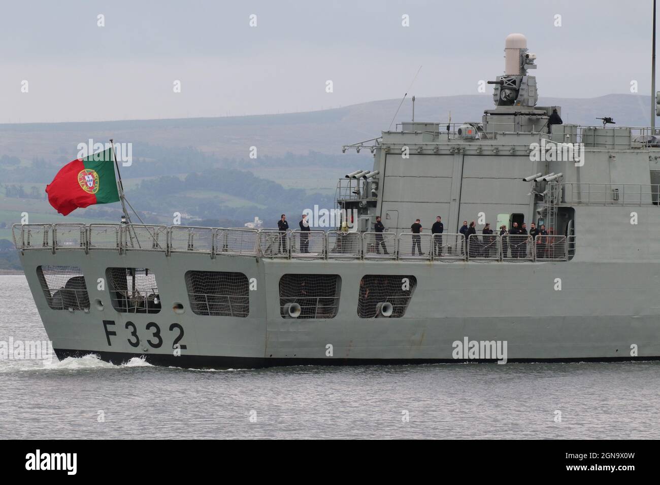 Some crew members gather on the flight deck of NRP Corte-Real (F332), a Vasco da Gama-class ...