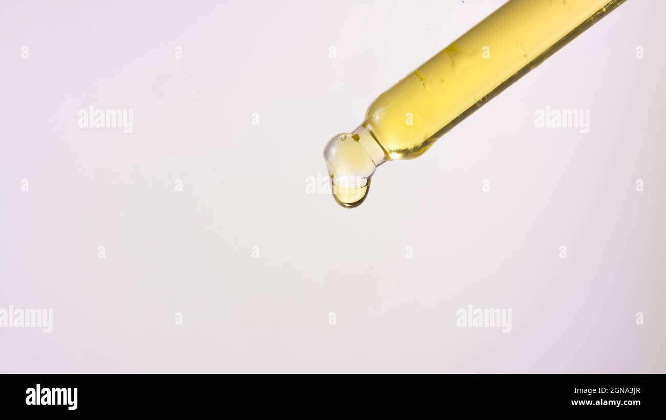 close up of oil dropper cbd thc extract white background Stock Photo ...