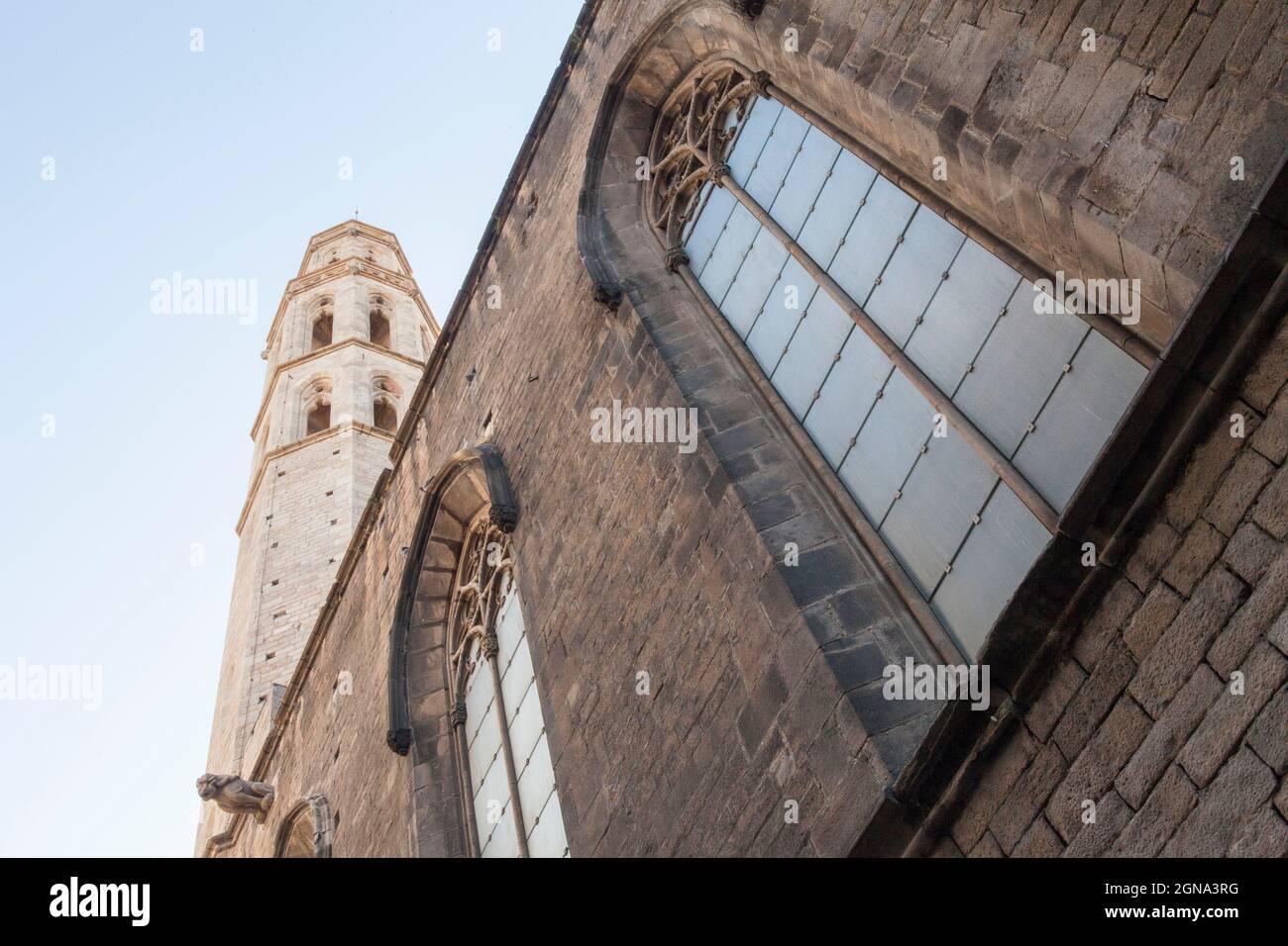 Low angle photo of old Spanish church architecture and windows tower ...