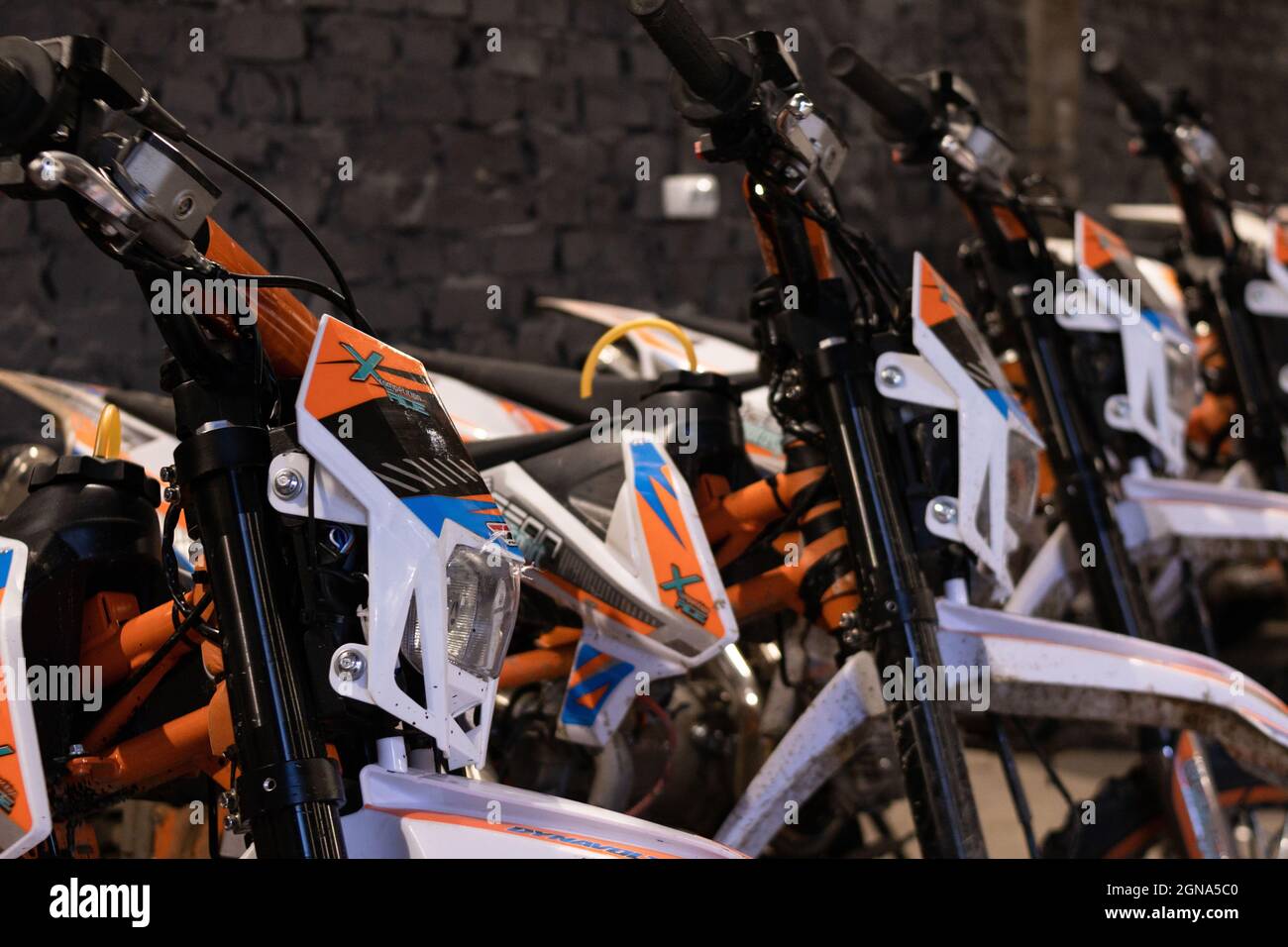 VINNYTSIA, UKRAINE - Jun 17, 2021: A display of the new colorful dirt bikes in the store Stock ...