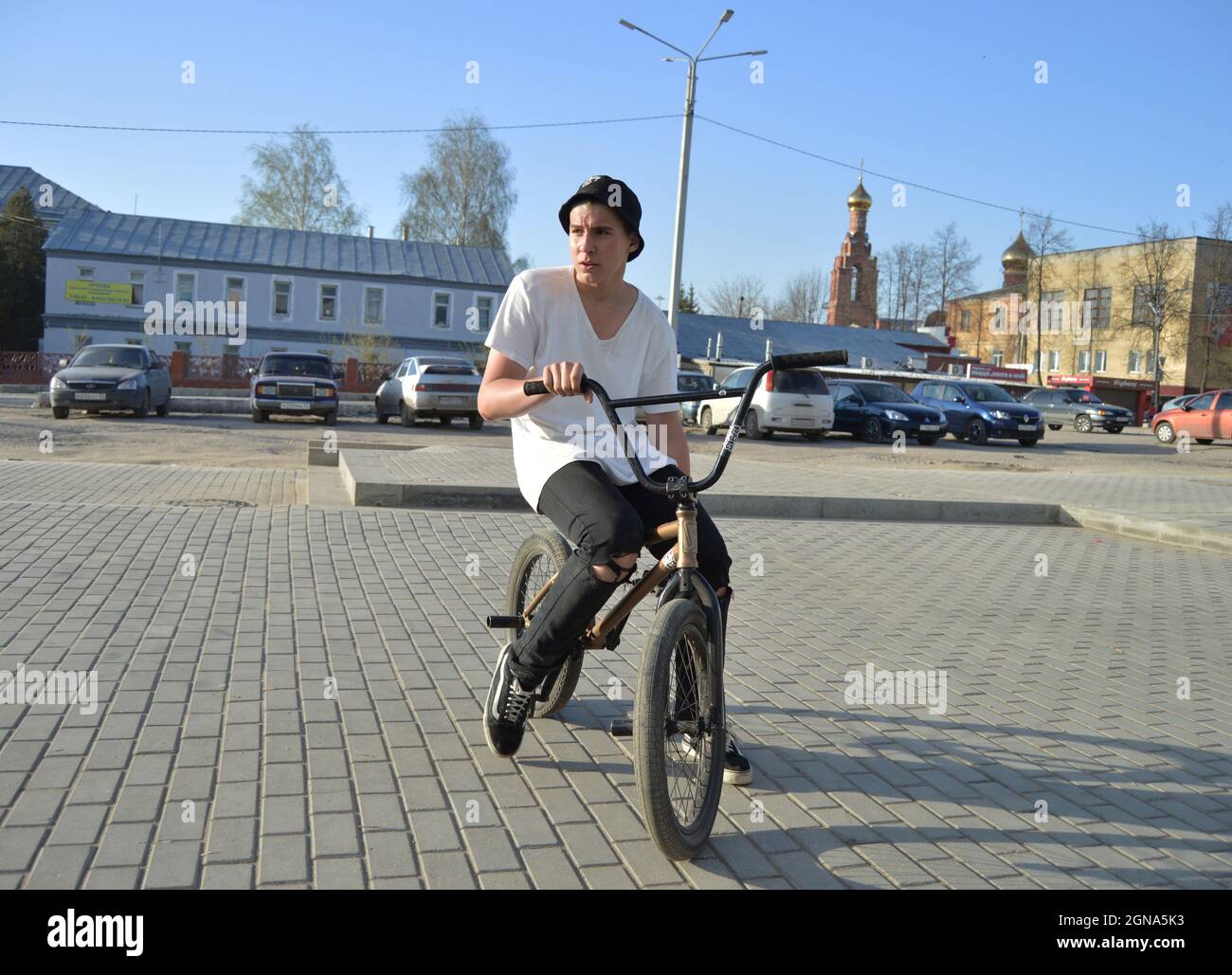 Kovrov, Russia. 30 April 2017. Teen on BMX bike near the shopping center Kovrov Mall Stock Photo ...