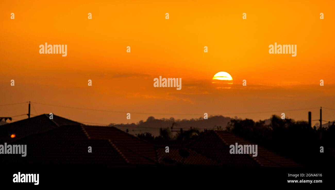 Telephoto photo of yellow orange sunset sunrise, clouds, sky golden ...