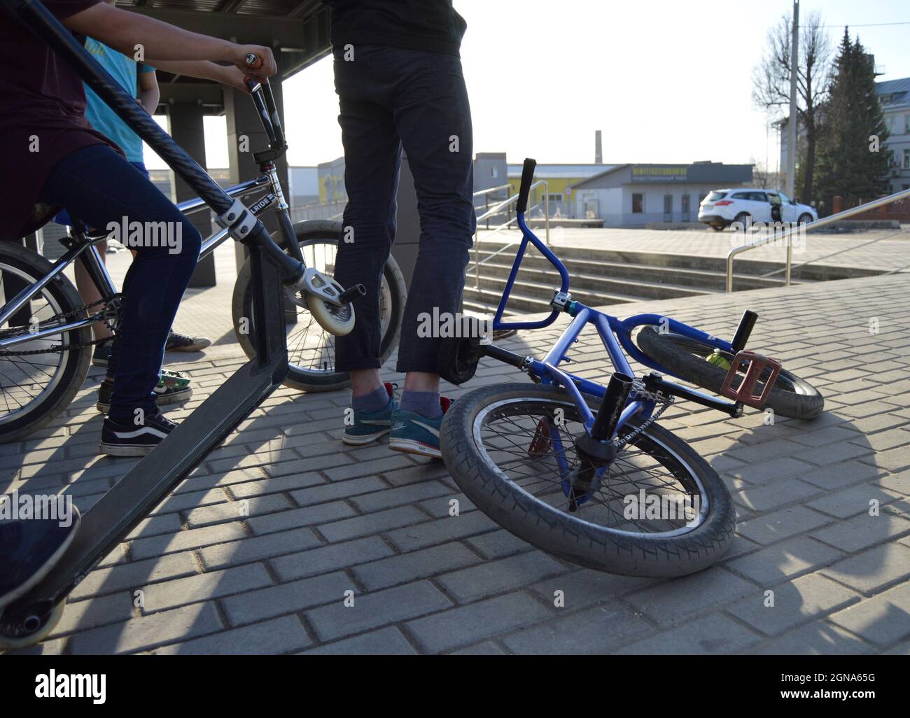 Kovrov, Russia. 30 April 2017. Teens on BMX bikes and scooter near the shopping center Kovrov ...