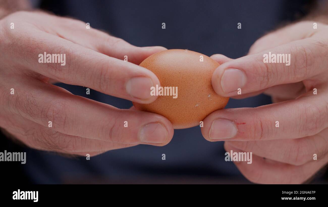 Breaking egg hi-res stock photography and images - Alamy