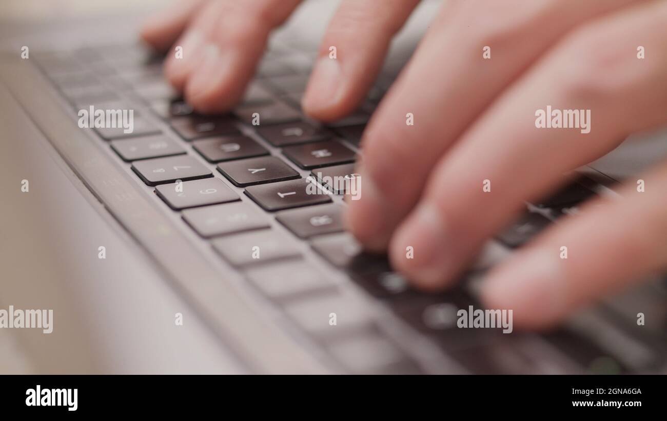 Close up macro of hands typing on laptop keyboard mac computer Stock ...