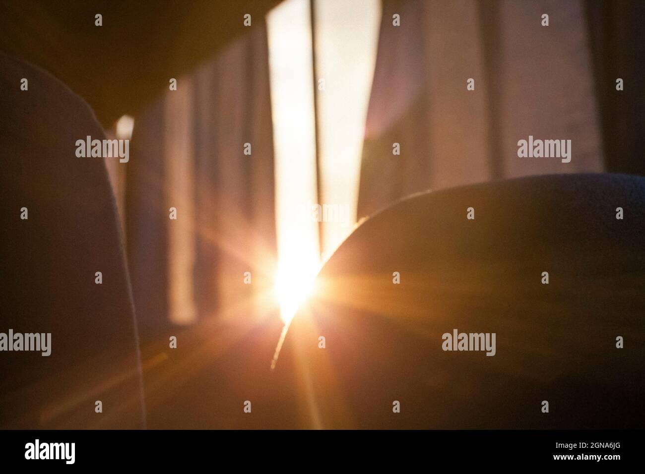 Sun flare through window in a traveling bus seat, light, emotional ...