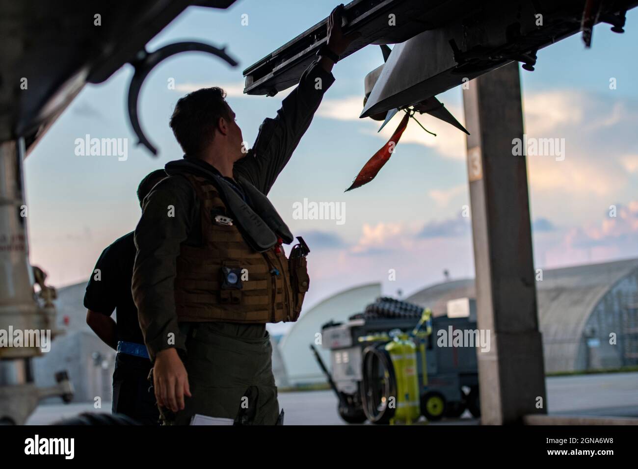 A pilot assigned to the 44th Fighter Squadron performs pre-flight ...