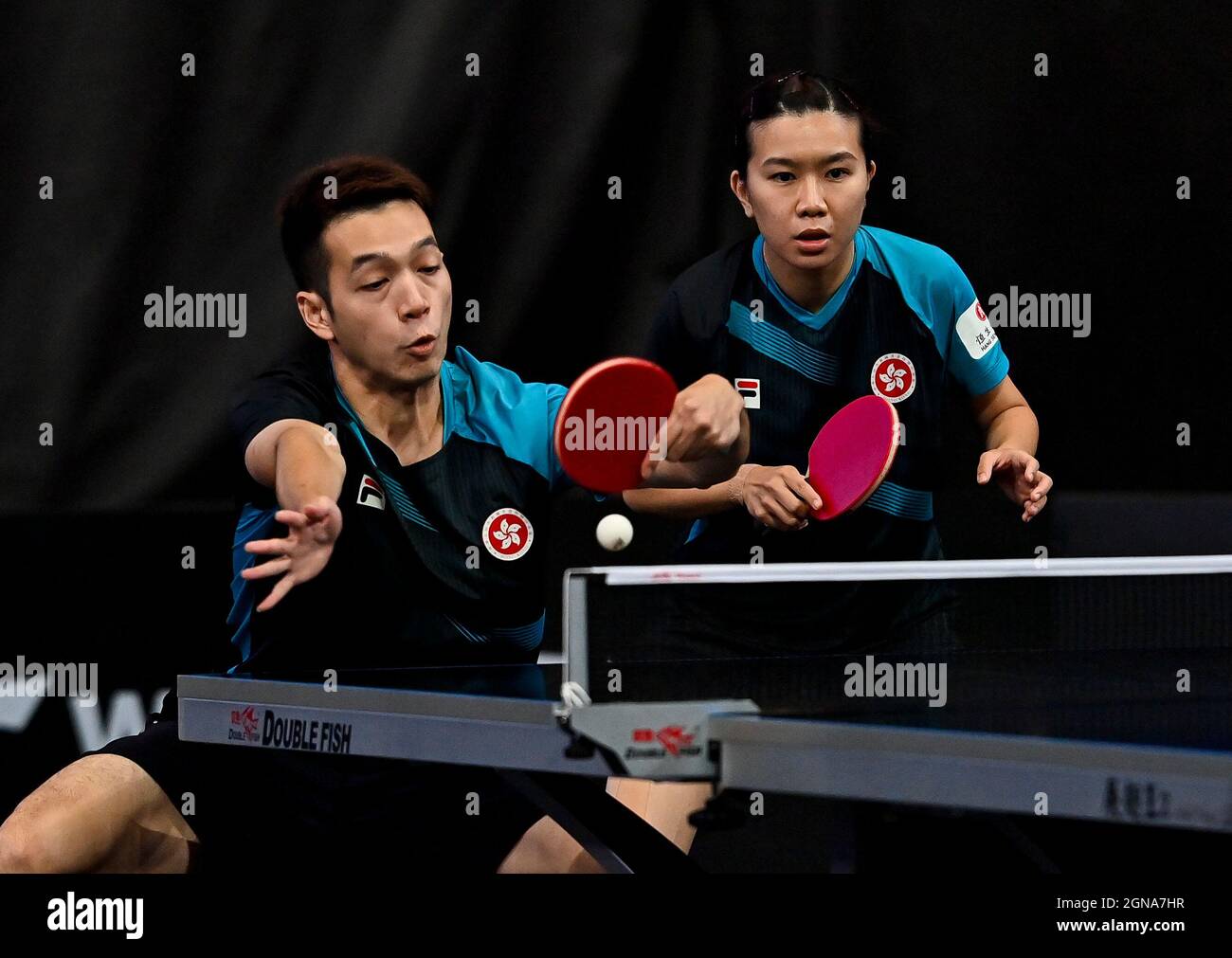 Doha, Qatar. 23rd Sep, 2021. Ho Kwan Kit (L) and Lee Ho Ching of China ...