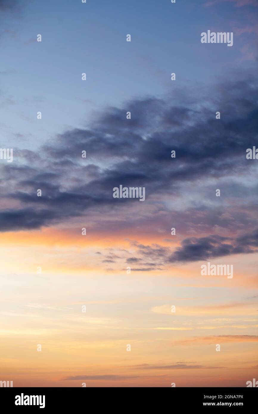 texture of sky during sunset clouds blue orange Stock Photo - Alamy