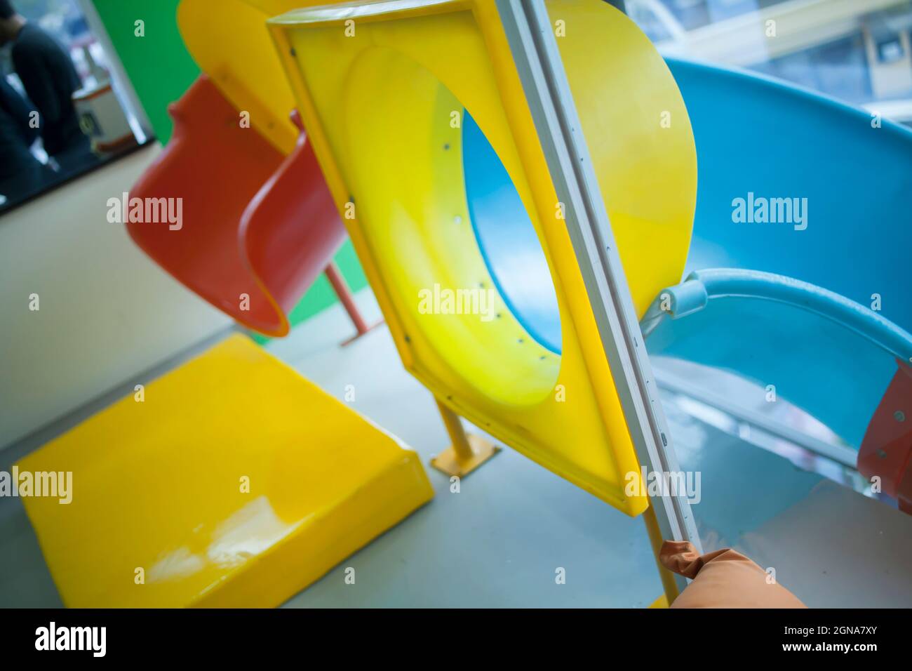 colorful slide in the workplace fun slide colors relax Stock Photo - Alamy