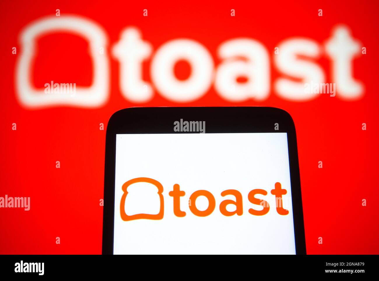 In this photo illustration a Toast Inc. logo is seen on a smartphone ...