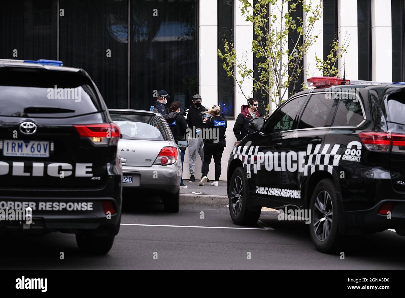 Melbourne, Australia, 24 September, 2021. Public Order police question ...
