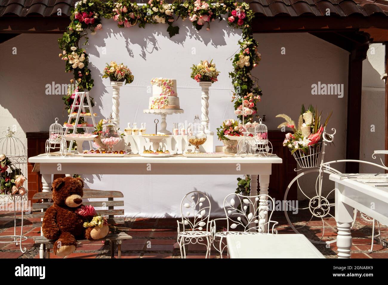 baptism reception party decor set up family religious celebration cake ...