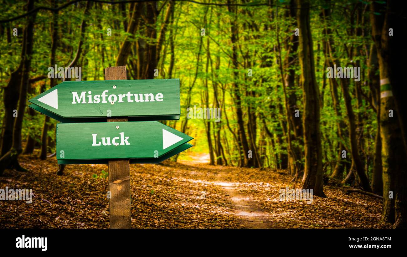 Street Sign the Direction Way to Luck versus Misfortune Stock Photo - Alamy