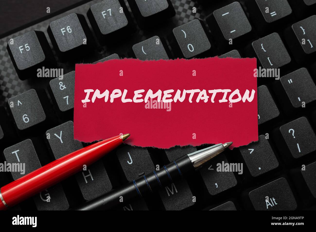 Handwriting Text Implementation Word Written On The Process Of Making Something Active Or