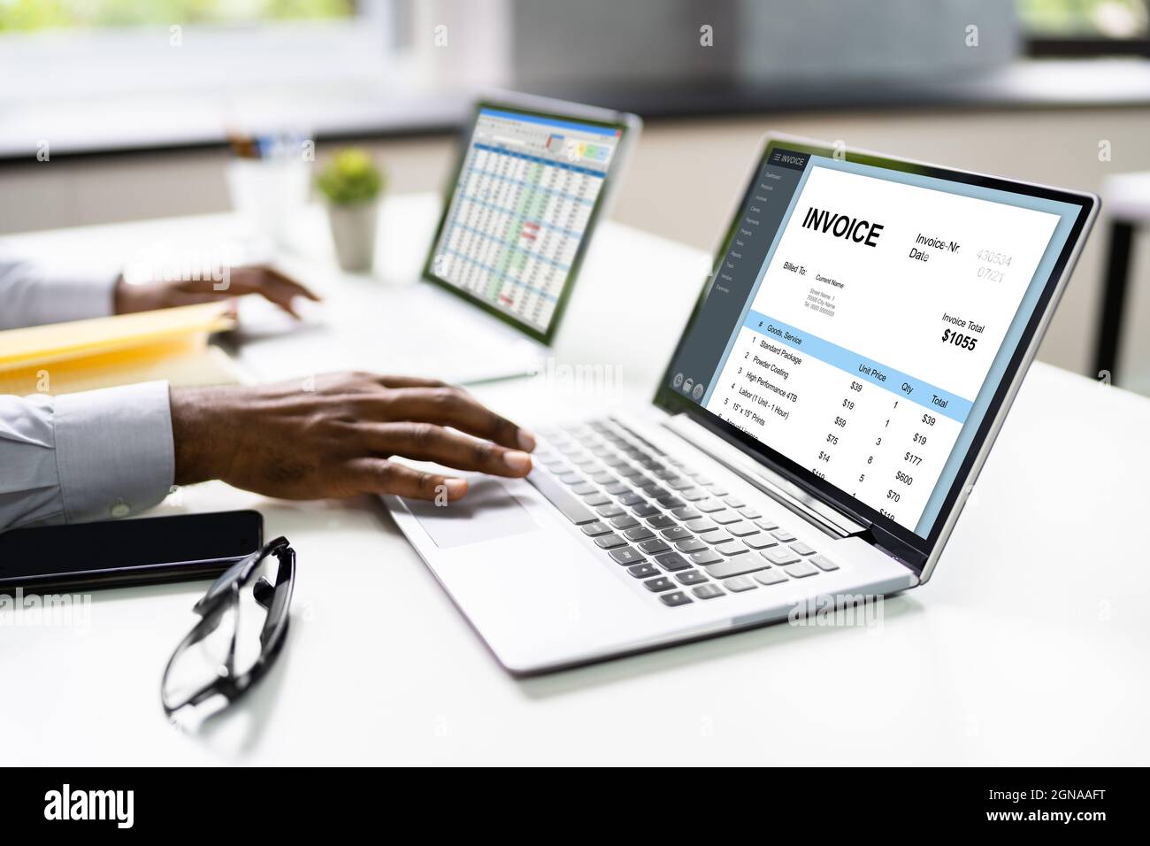 Medical Codes And Accounts Manager In Office With Bill Stock Photo - Alamy