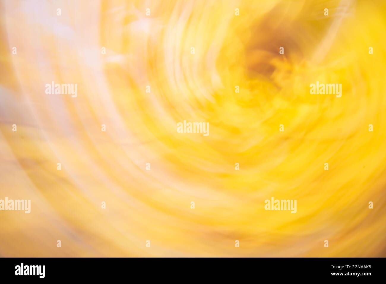 Abstract warm yellow sun with circular rays. Photo effect Stock Photo ...