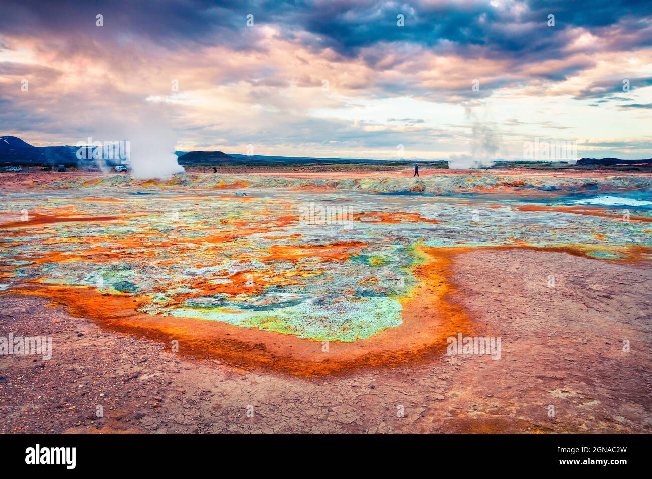 Steaming fumaroles in geothermal valley Hverarond. Exotic summer ...