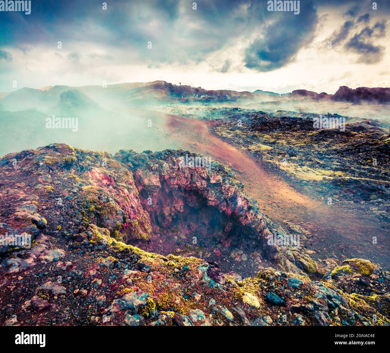 Fields of steamy waters in the Krafla volcano. Colorful exotic ...