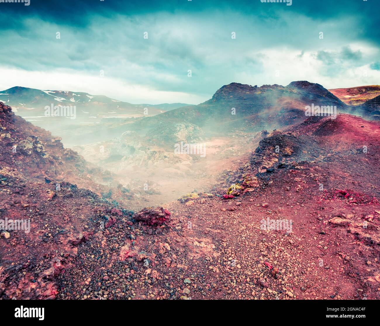 Fields of steamy waters in the Krafla volcano. Colorful exotic ...