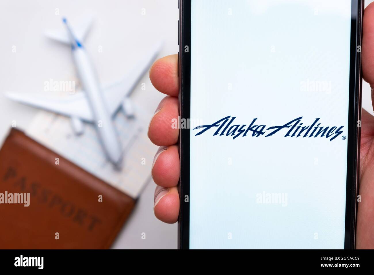 Alaska Airlines company app or logo displayed on a mobile phone with ...