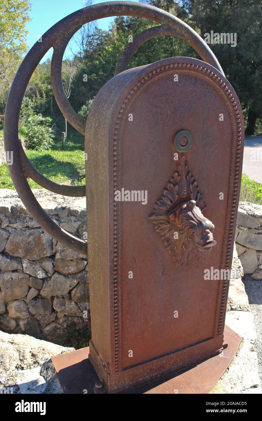 Antique wheel pump Stock Photo - Alamy
