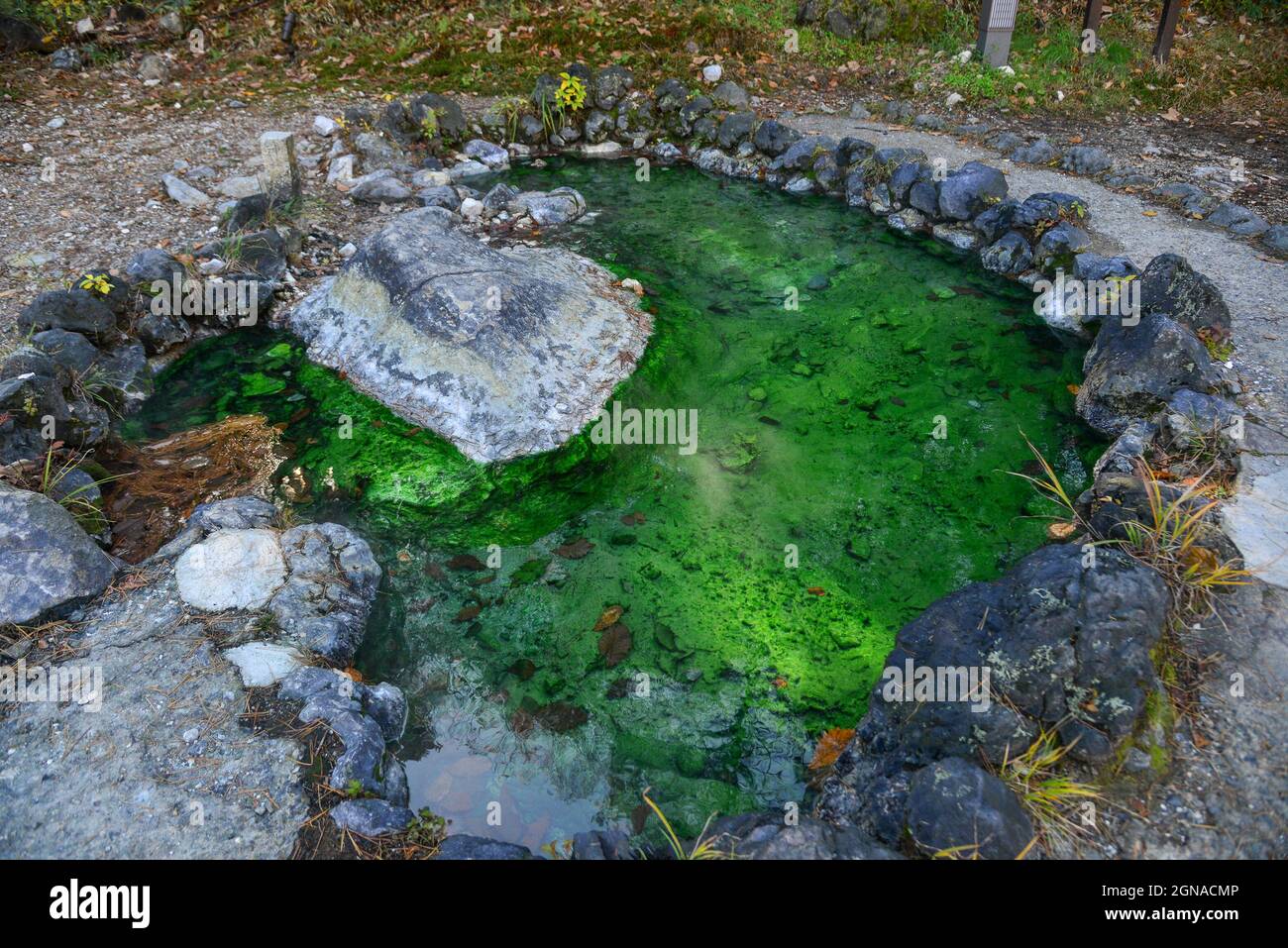Hot water pond at Kusatsu Onsen in Gunma, Japan. Kusatsu Town is one of ...