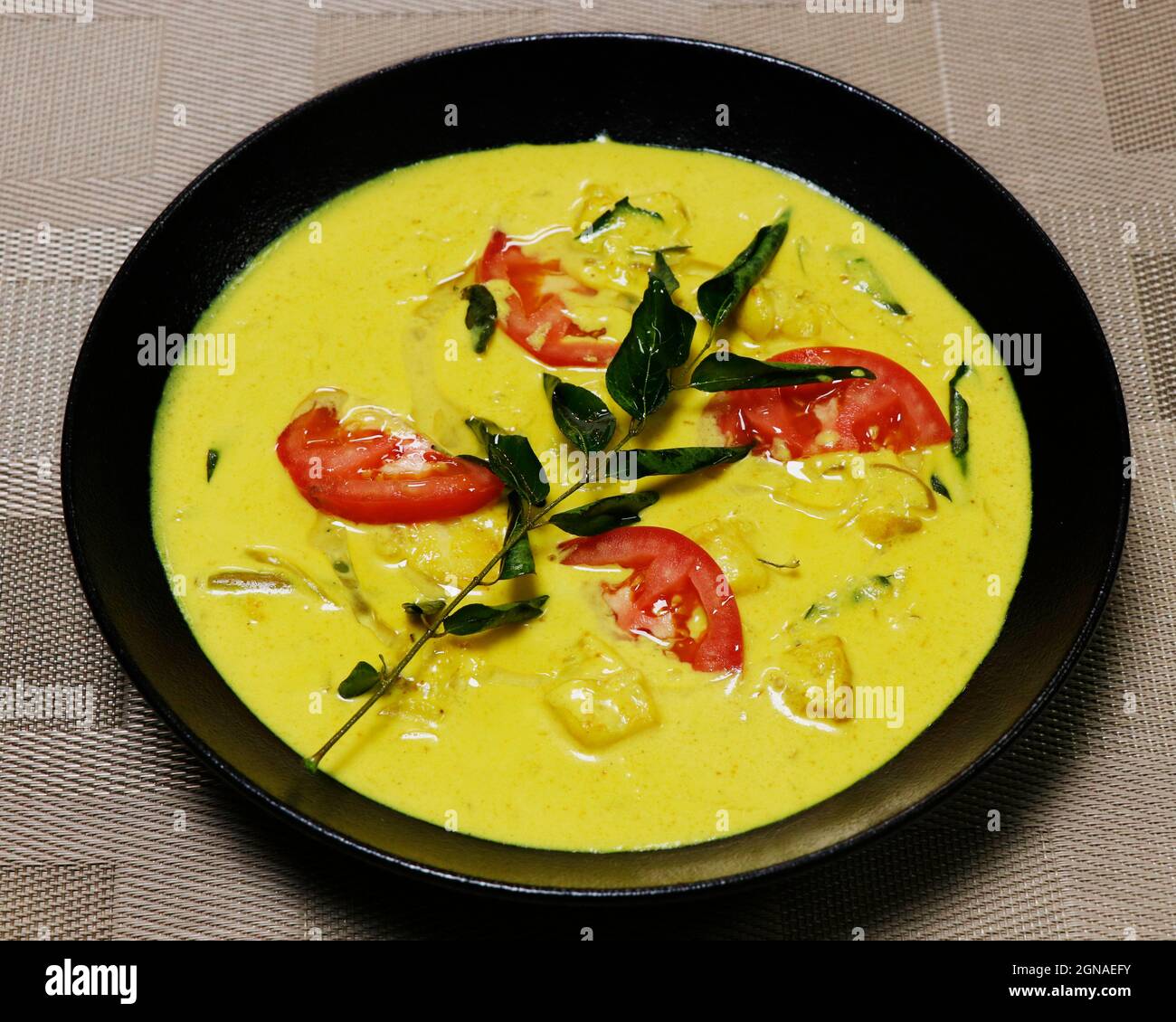 fish molee with king fish cooked in mild spiced coconut milk ...