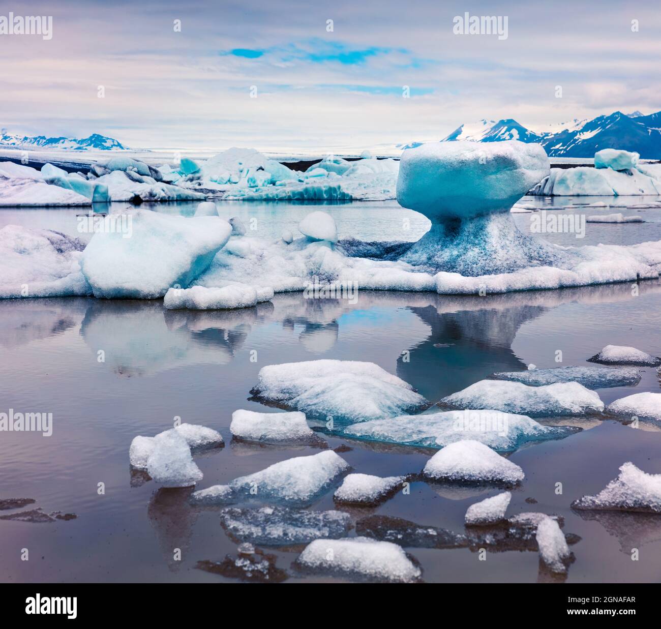 Floating ice box on the Fjallsarlon glacial lagoon. Bright morning ...