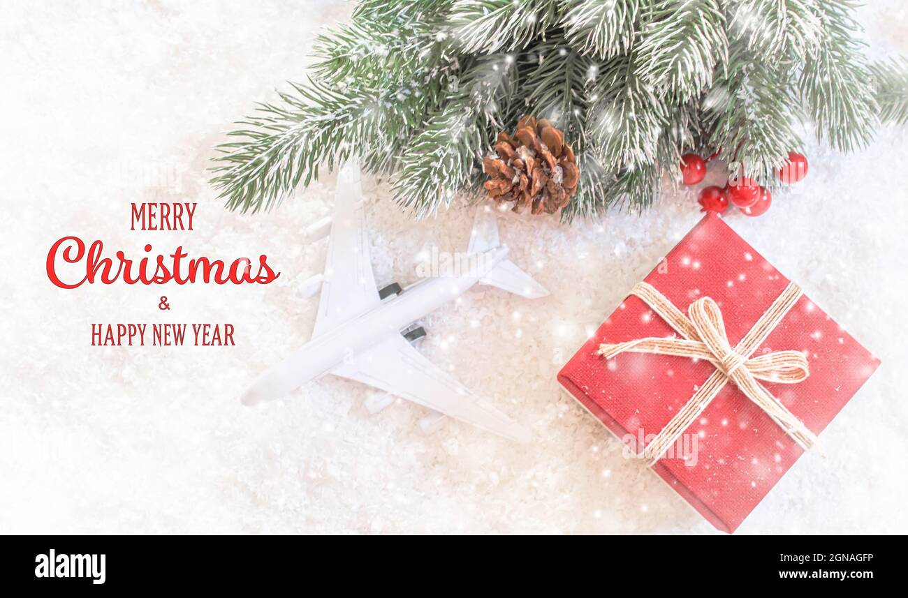 Travel for Christmas. Airplane with Christmas decor.New year.Selective ...
