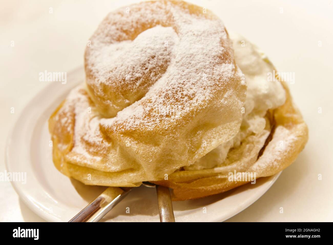 Traditional spanish bakery pastry dessert, ensaimada. Mallorca dessert ...