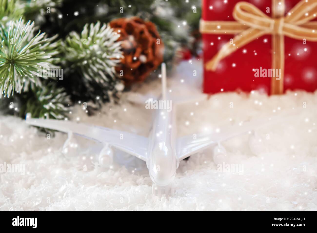 Travel for Christmas. Airplane with Christmas decor.New year.Selective ...