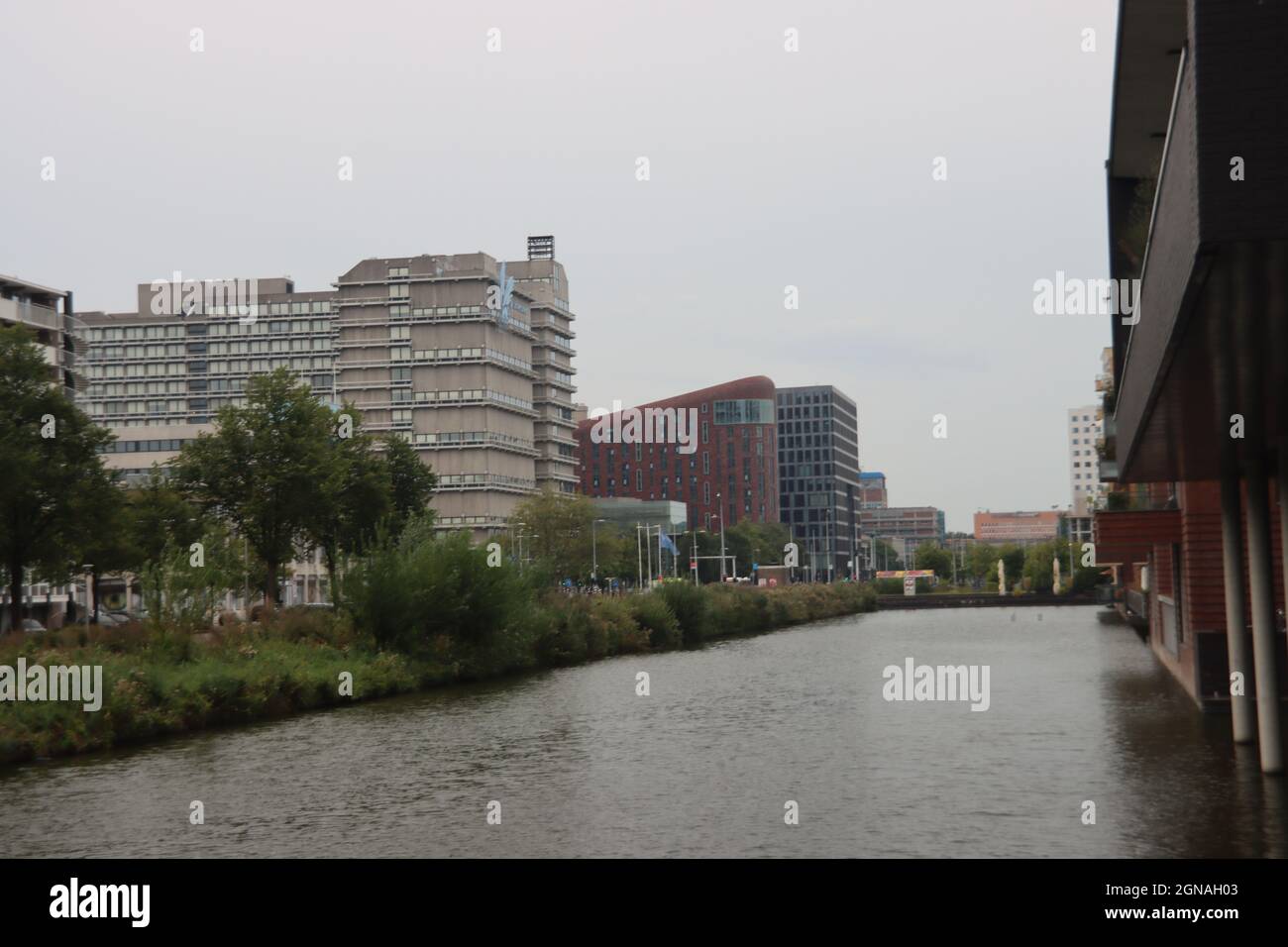 Buidings around train, metro and tramstation Amsterdam Zuid as heart of ...