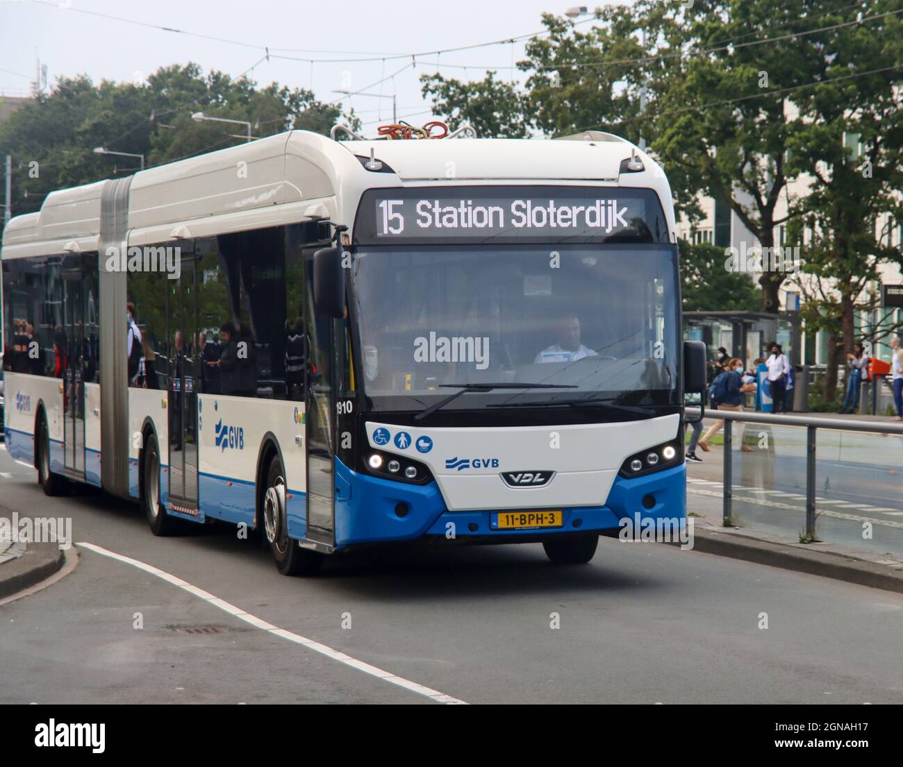 Blue and white city bus of VDL at Amsterdam station zuid runned by GVB ...