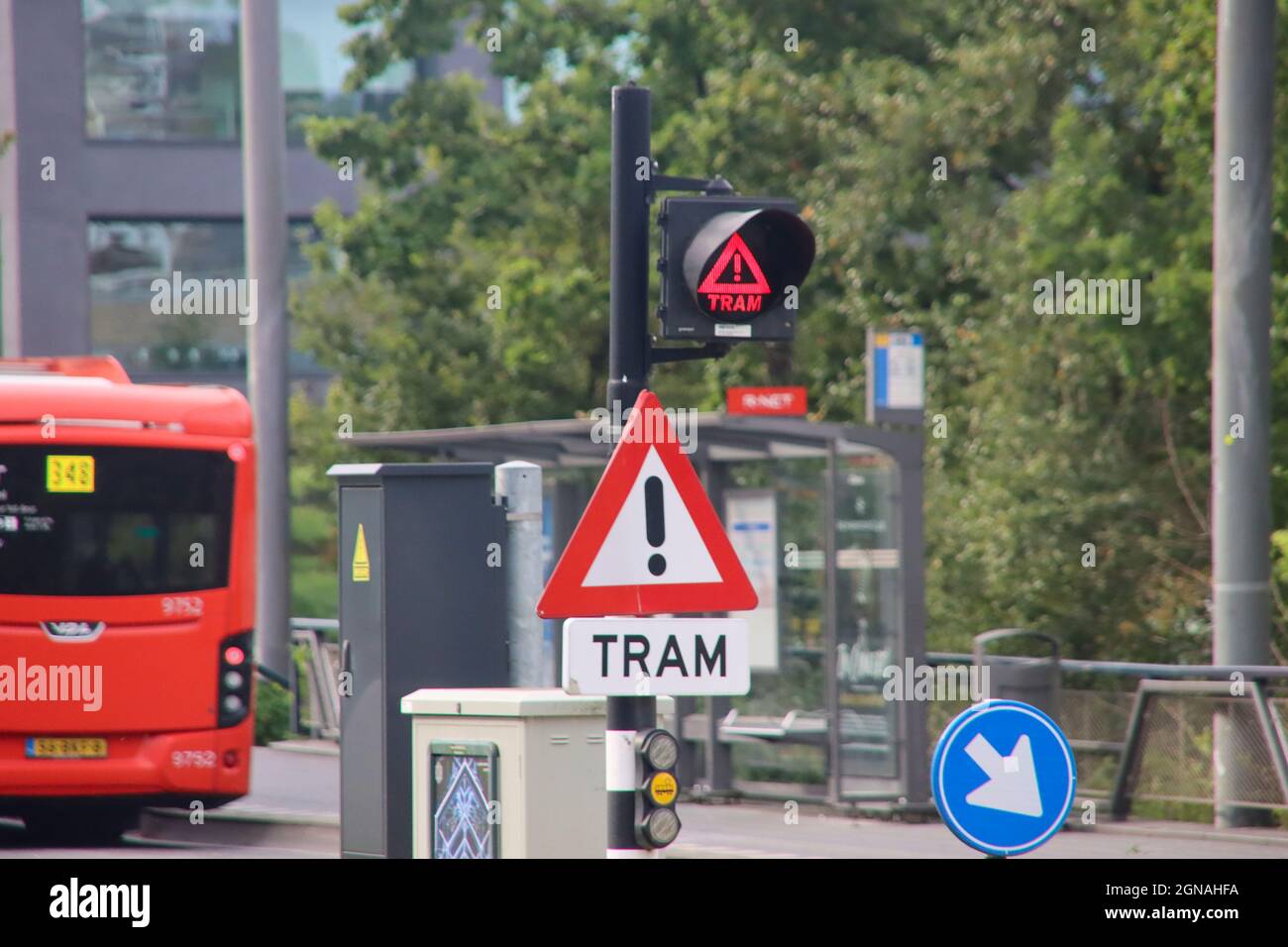 Red warning sign with sound and lights at tram passing point at ...