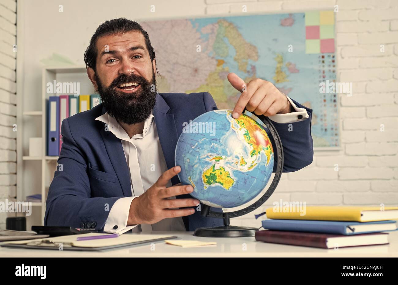 Geographer looking at map hi-res stock photography and images - Alamy