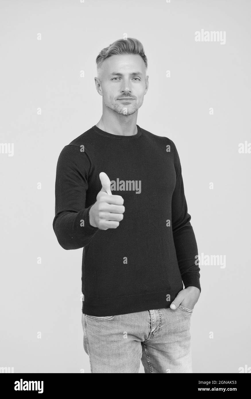 Confident handsome male showing Black and White Stock Photos & Images ...