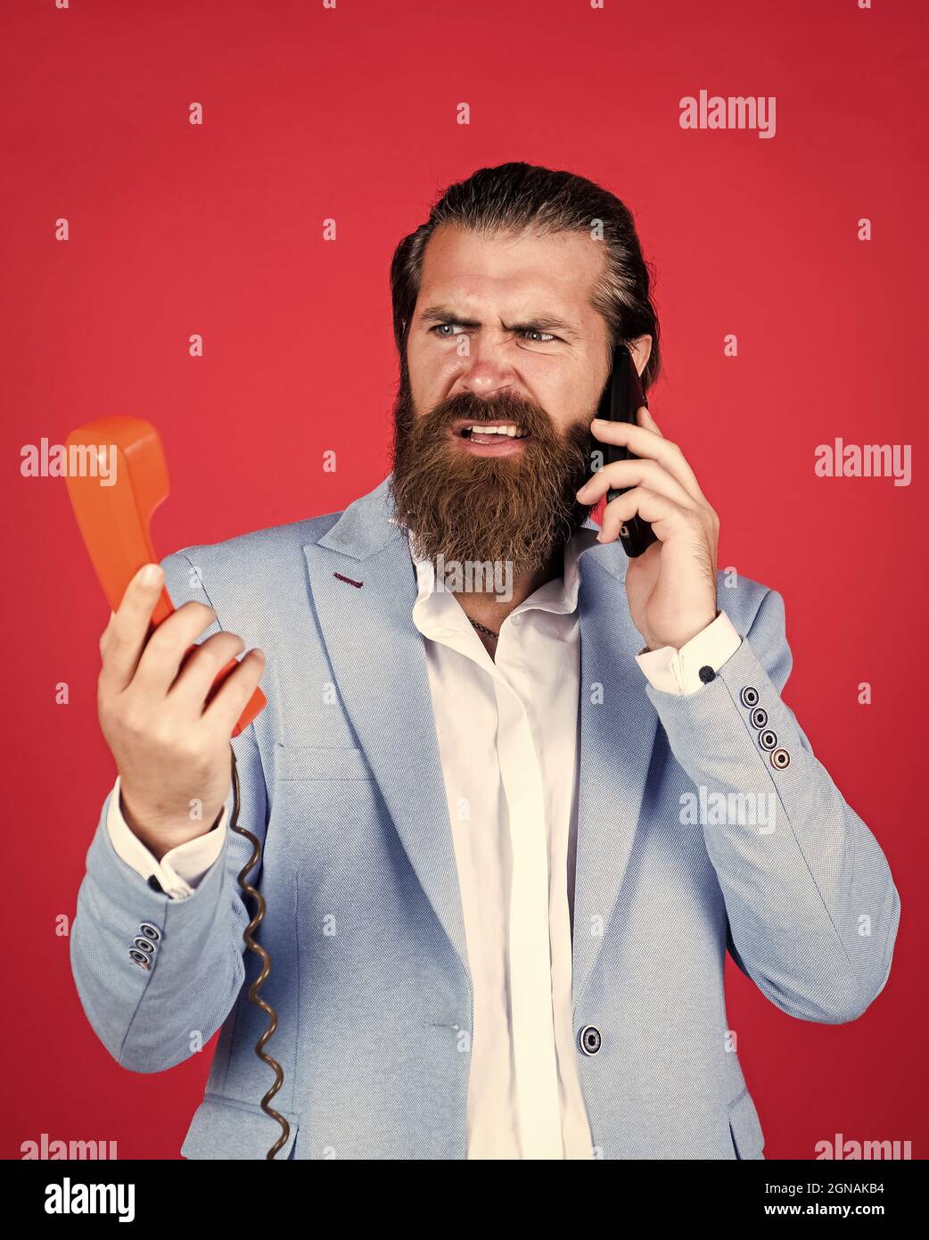 bearded hipster use retro telephone. communication concept. brutal ...