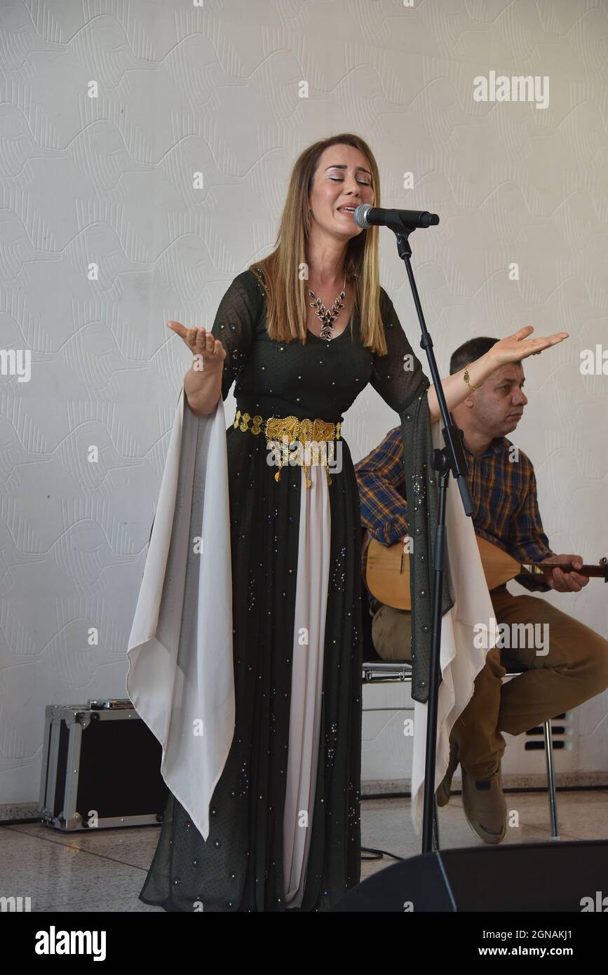 Cologne, Germany. 23rd Sep, 2021. Singer Hozan Cane sings during a ...