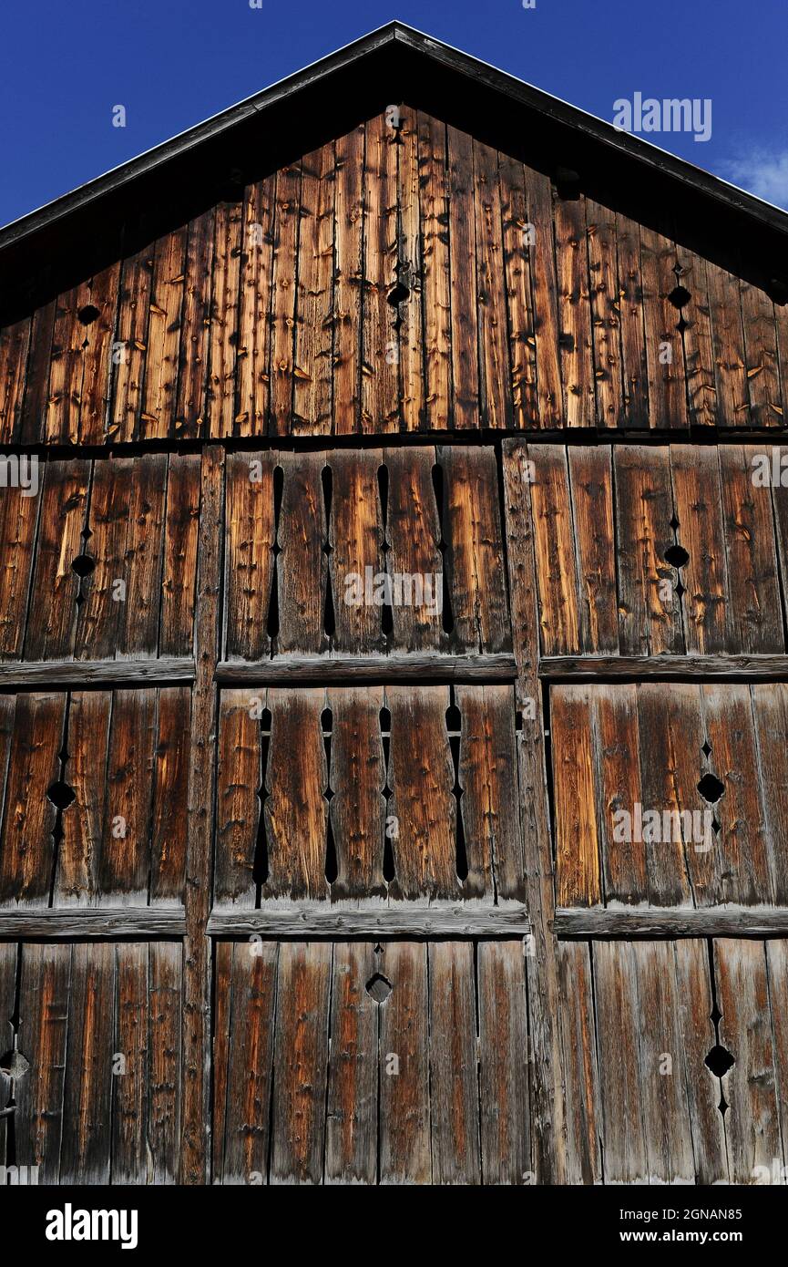 Gable end of a traditional timber framed Swiss barn with its vertical ...