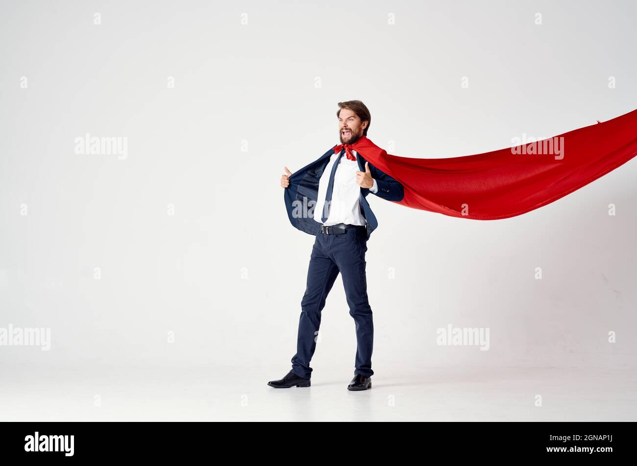 business man in red cloak protecting the city superhero work Stock ...