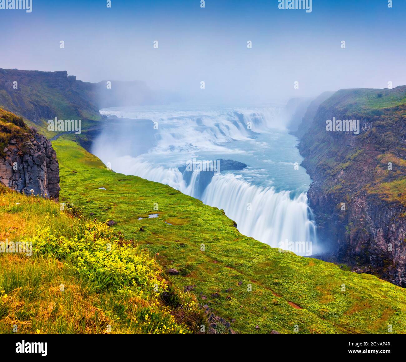 Huge waterfall Gullfoss in the morning mist. Colorful summer scene on ...