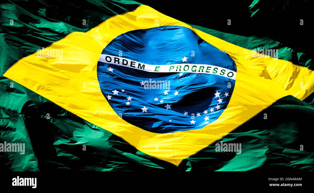 Wavy flag of Brazil with the national motto "Order and Progress ...