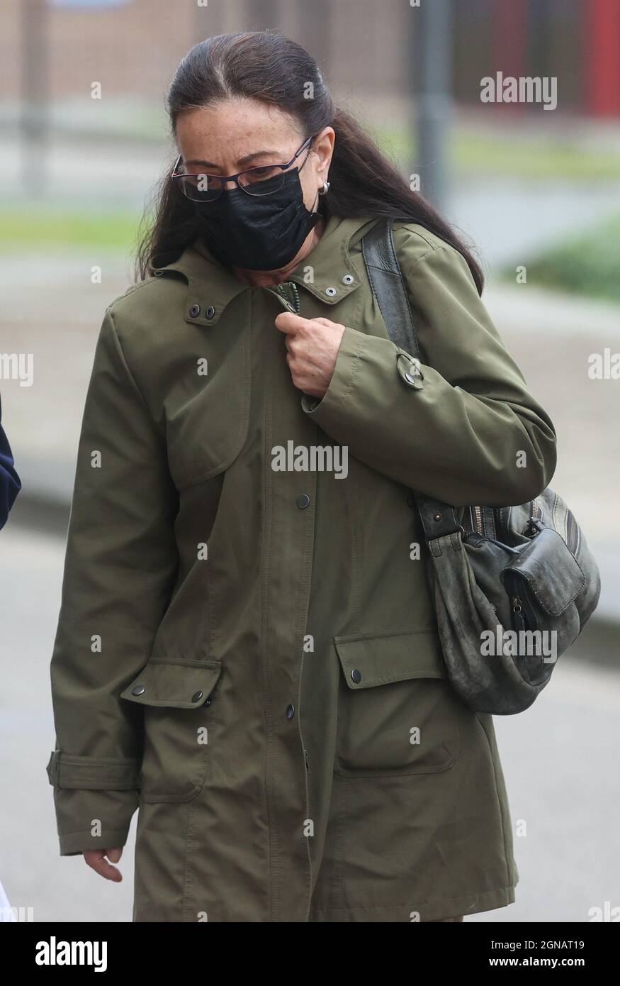 People arrive for the opening session of the case against 18 members of ...