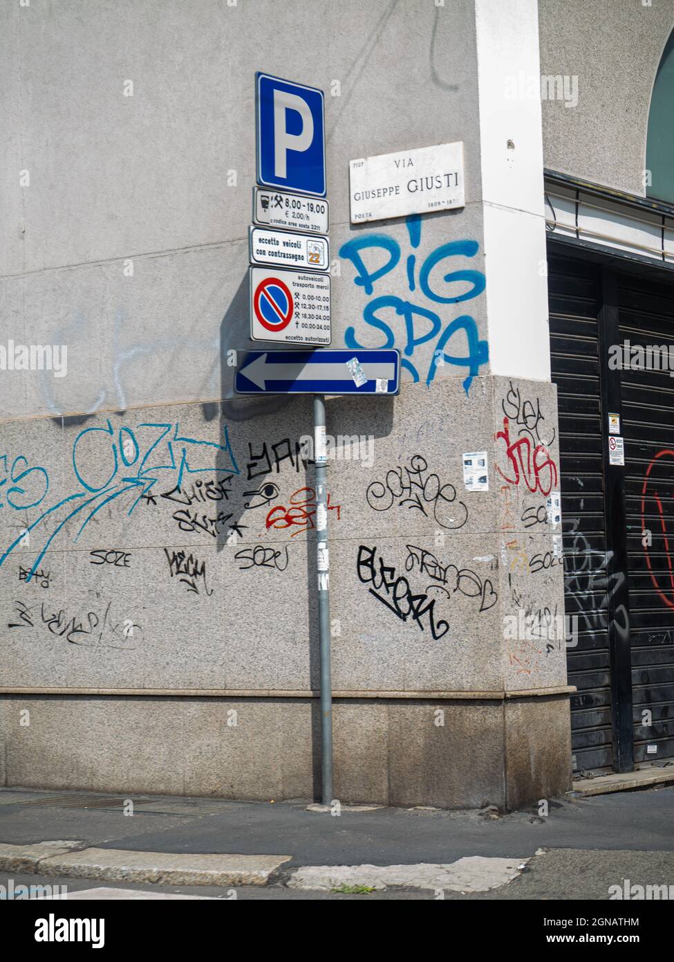 MILANO, ITALY - Aug 08, 2021: A vertical shot of road signs and ...