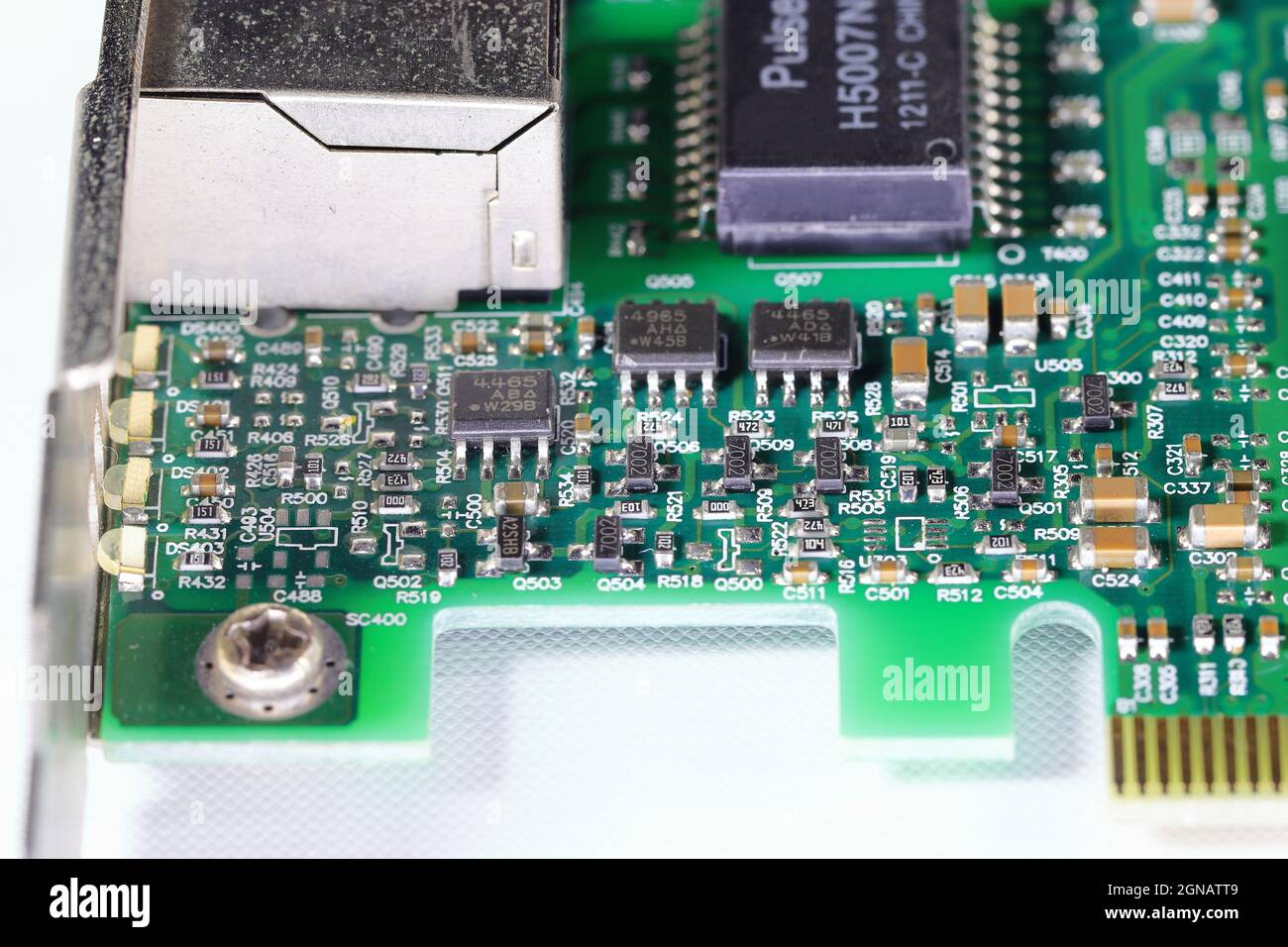 Old Printed Circuit Board with many electronics components Stock Photo ...