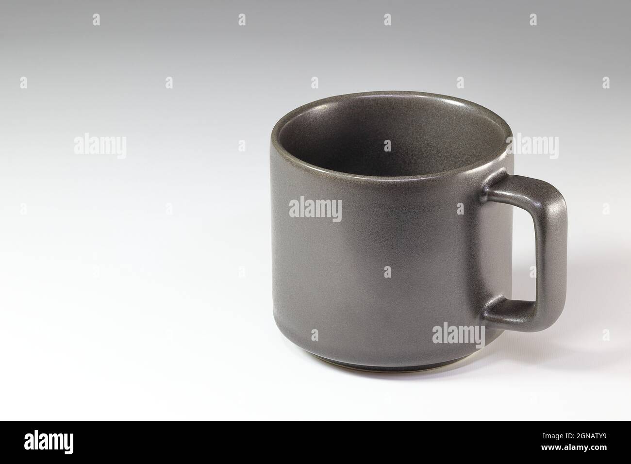 close up Black ceramic mug. empty black tea or coffee cup isolated on ...